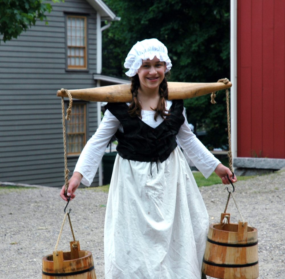 Colonial Girl carrying water | Wilton Historical Society